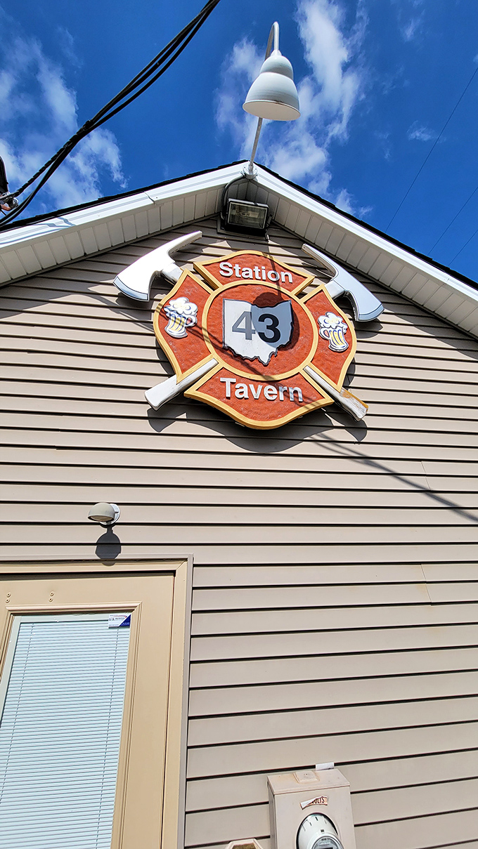 The unassuming exterior of Station 43 Tavern proves once again that culinary treasures often hide in plain sight, with its firehouse emblem promising heated delights within.