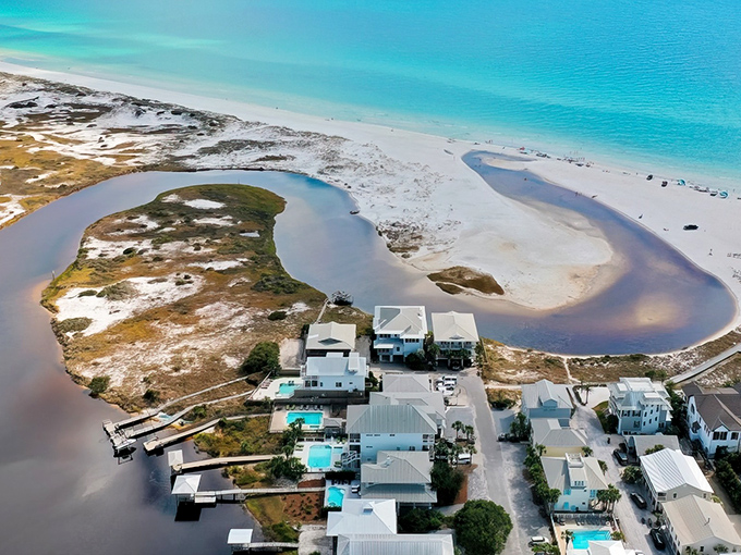 Where freshwater meets saltwater in a mesmerizing dance. Western Lake spills into the Gulf, creating nature's own watercolor masterpiece at Grayton Beach.