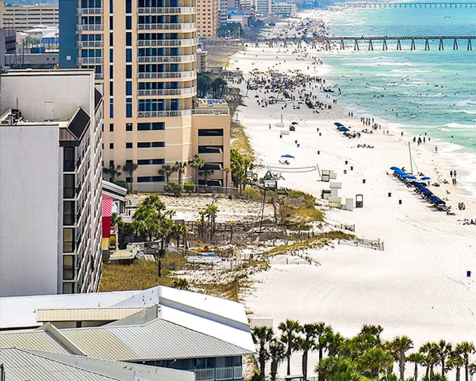 Sugar-white sands stretch for miles along Panama City Beach, where high-rises meet emerald waters in a dance of affordable luxury and natural splendor.