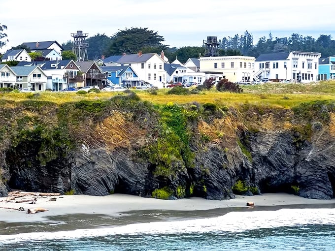 Perched dramatically on rugged cliffs, Mendocino's colorful Victorian homes stand like sentinels above the Pacific, where New England charm meets California's wild coastline.