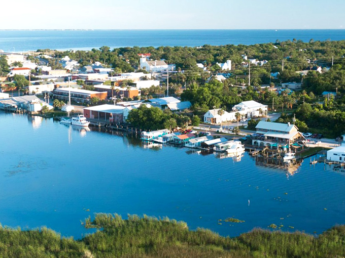 Apalachicola's waterfront whispers tales of maritime heritage while modern life hums along its shores&mdash;a perfect harmony of past and present.