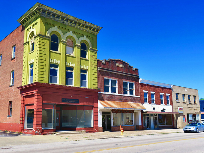 Conneaut's downtown architecture tells stories in brick and mortar. That vibrant yellow building stands like a cheerful sentinel guarding small-town memories.