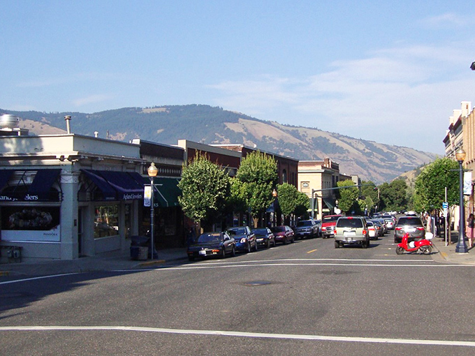 Downtown Hood River's historic buildings stand like well-dressed sentinels, their awnings providing shade for window shoppers and their mountain backdrop stealing the show.