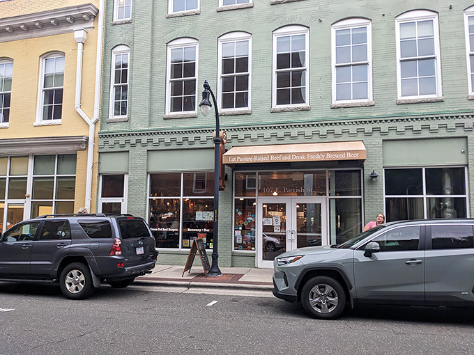 The mint-green facade of Bull City Burger and Brewery beckons hungry passersby with promises of grass-fed beef burgers and craft brews in downtown Durham.