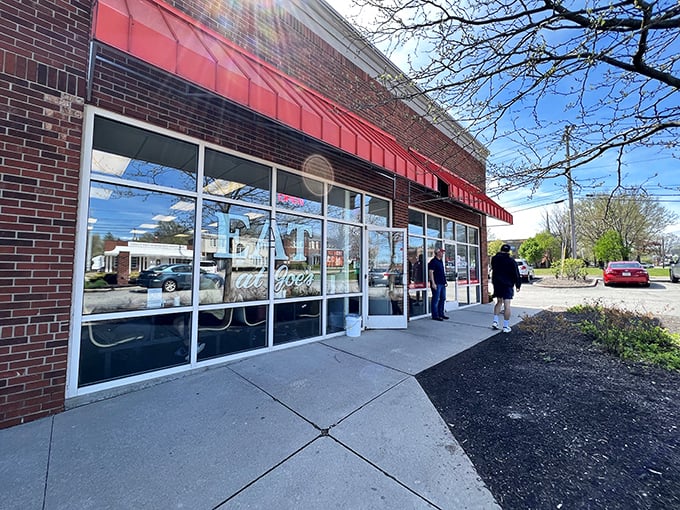 The unassuming red awning of Eat at Joe's beckons like a breakfast lighthouse on South Green Road, promising comfort and satisfaction to all who enter.