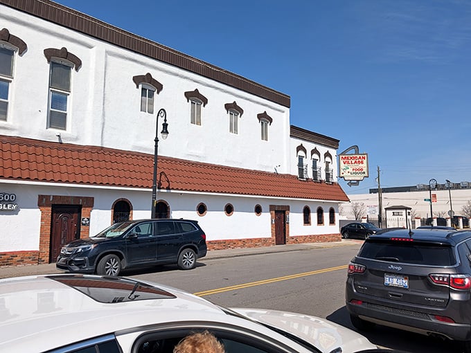 The corner brick building with its distinctive yellow awnings has been a Detroit landmark for generations of enchilada enthusiasts.