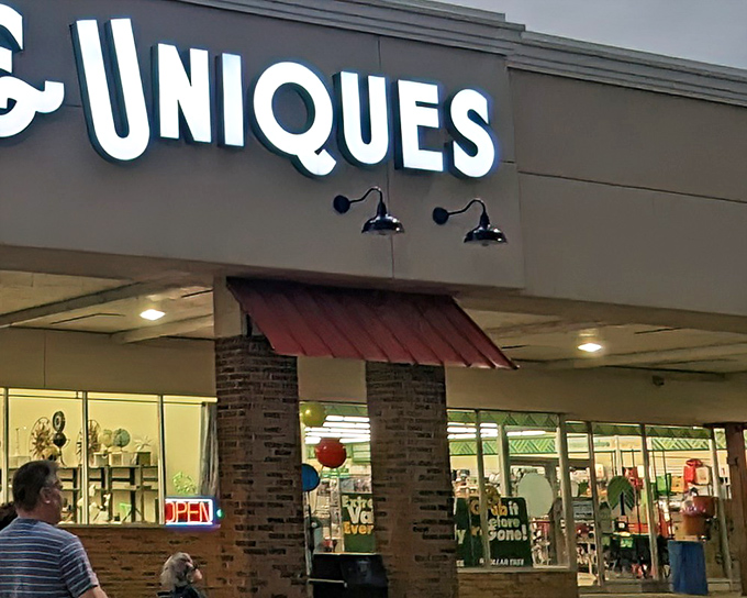 The unassuming storefront of Antiques & Uniques belies the wonderland of treasures waiting inside. Like a time machine disguised as a strip mall tenant.