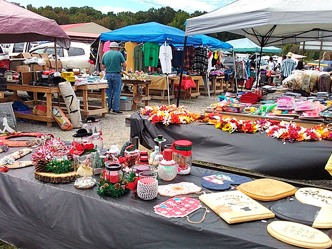 The covered walkways of Webb Road Flea Market stretch into the distance like a treasure hunter's yellow brick road. Every table holds potential discoveries!