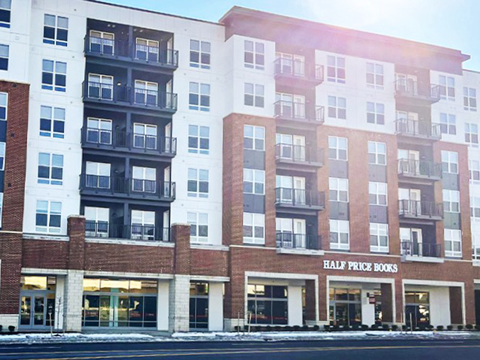 The welcoming brick facade of Half Price Books on Lane Avenue promises literary treasures within, like a beacon for bibliophiles.