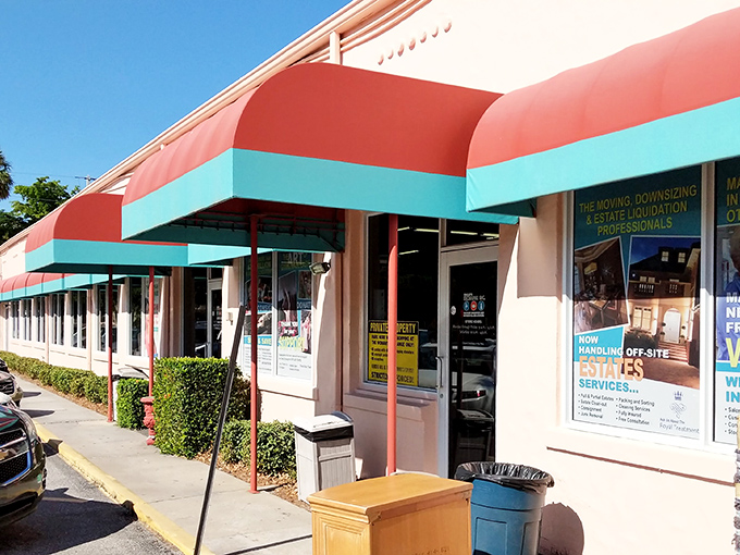 That cheerful coral and turquoise exterior practically shouts "Come discover something amazing inside!"