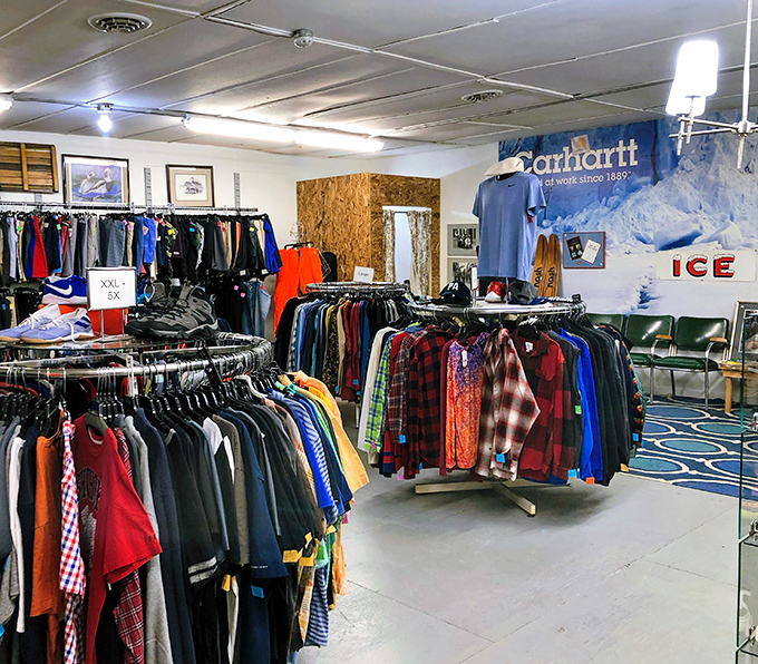 Treasure hunting paradise! Endless racks of clothing stretch beneath rustic wooden beams, each hanger potentially holding your next favorite outfit.