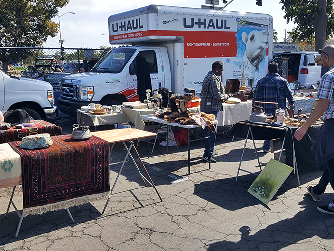 The treasure hunter's paradise unfolds across the Sports Arena parking lot, where one person's castoffs become another's prized possessions.