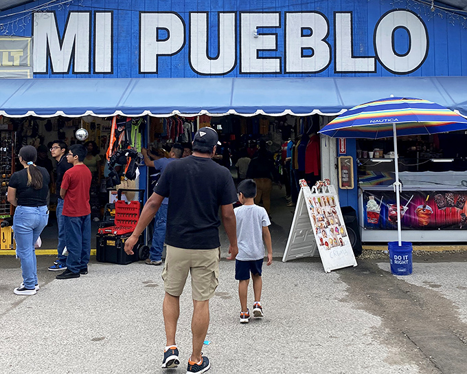 The unmistakable purple facade of Mi Pueblo stands out like a flamingo at a penguin convention, beckoning bargain hunters with its vibrant promise of treasures within.