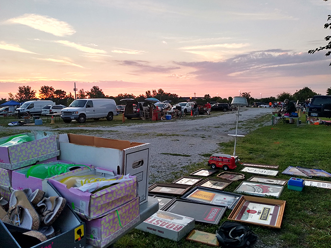 Sunset shopping at its finest &ndash; vendors set up their treasures against a cotton candy sky as early birds hunt for tomorrow's heirlooms.