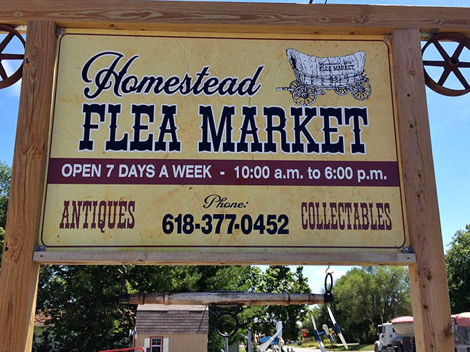 The weathered tin roof and rustic "FLEA MARKET" sign aren't just decoration&mdash;they're a promise of treasure hunting adventures waiting inside.