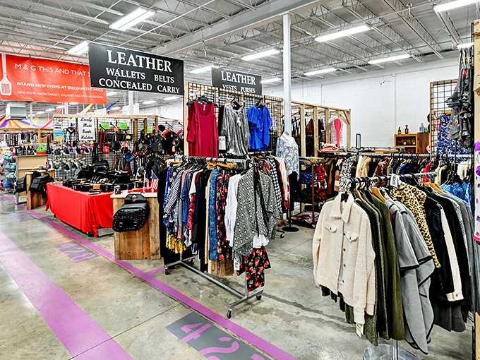 Wide aisles with red pathways guide treasure hunters through a wonderland of fabrics and clothing. Bargain bliss awaits at every turn!
