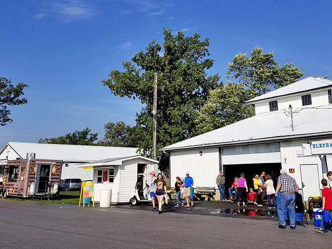 Welcome to treasure hunter paradise! The Tiffin Flea Market's entrance beckons with promises of discoveries waiting just beyond those white buildings.