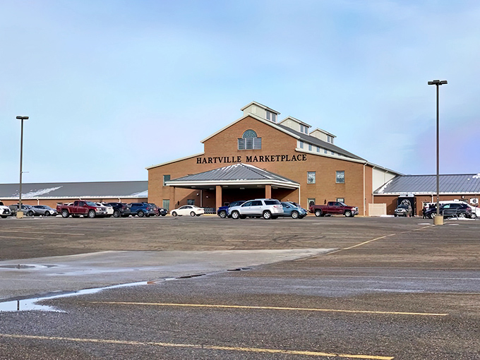 The iconic barn-inspired exterior of Hartville MarketPlace welcomes treasure hunters with the promise of discoveries waiting inside. Ohio's retail wonderland stands ready.