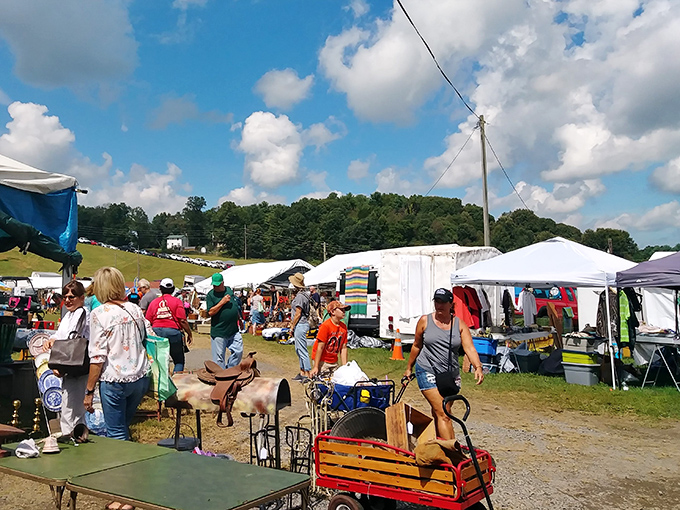 A treasure hunter's paradise stretches before you, with white tents dotting the landscape like sails on an ocean of possibilities.