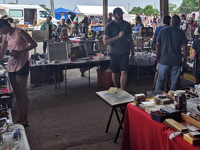Treasure hunters navigate the covered pavilions where yesterday's castoffs await their second act. The thrill of discovery hangs in the air as thick as Wisconsin summer humidity.