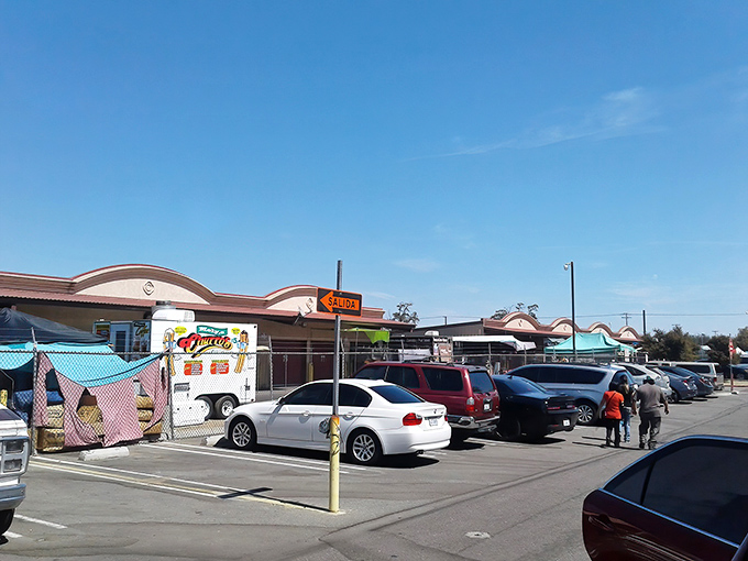The sprawling exterior of El Rematito beckons with promises of treasures waiting to be discovered under that perfect Central Valley blue sky.
