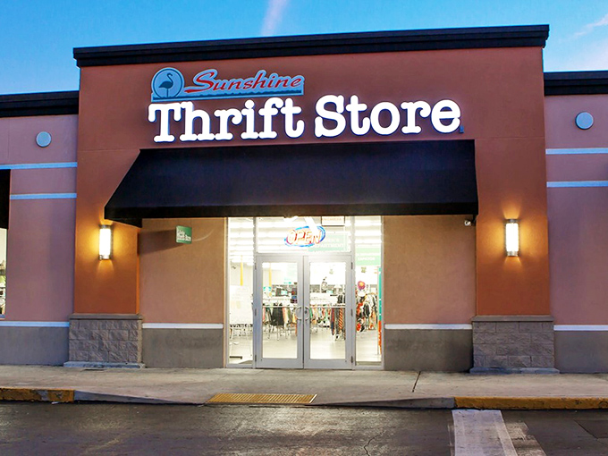 The coral-colored exterior of Sunshine Thrift Store stands like a beacon of bargain hope in St. Petersburg. No fancy frills, just treasure-hunting paradise inside.