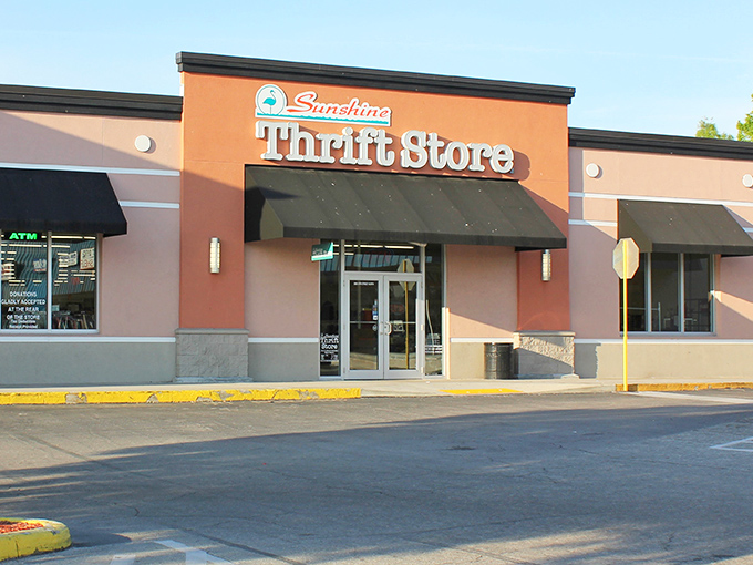The coral-colored exterior of Sunshine Thrift Store stands like a beacon of bargain hope in St. Petersburg. No fancy frills, just treasure-hunting paradise inside.