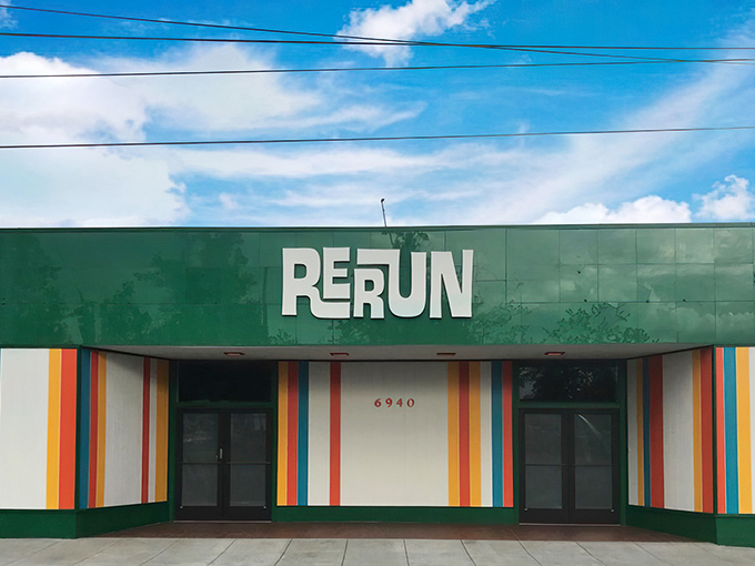 RERUN's vibrant green facade with rainbow stripes isn't just eye-catching&mdash;it's a preview of the technicolor treasure hunt waiting inside. Portland's vintage paradise beckons!