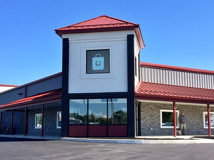 The distinctive red-roofed building stands like a beacon for bargain hunters, promising treasures within its modern exterior.