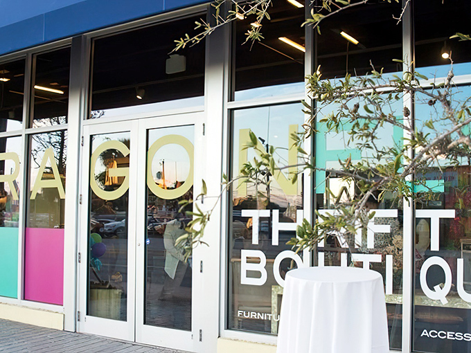 The sleek storefront of Dragonfly Thrift Boutique beckons with modern design and colorful accents—proof that "thrift" and "boutique" can happily coexist in retail harmony.