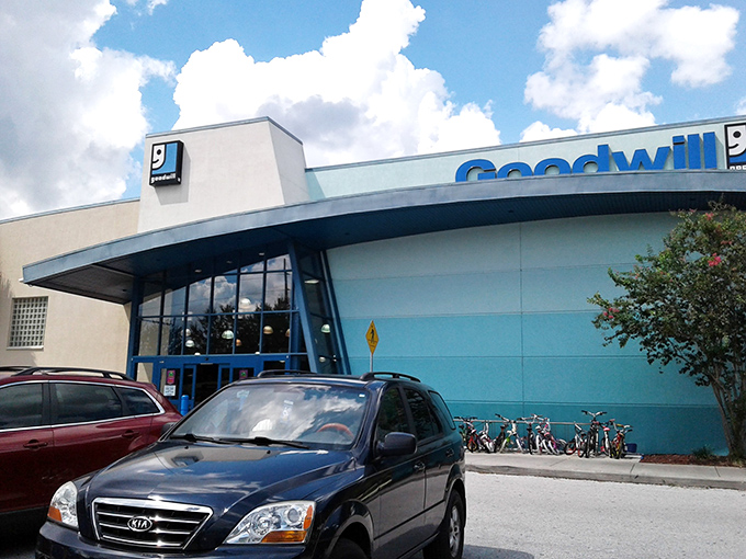 Modern retail architecture meets thrift store magic, where bargain hunters park their chariots for treasure hunting adventures.