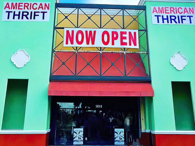 The mint-green facade of American Thrift Store stands out like a beacon of bargain possibilities, promising treasures behind those "NOW OPEN" doors.
