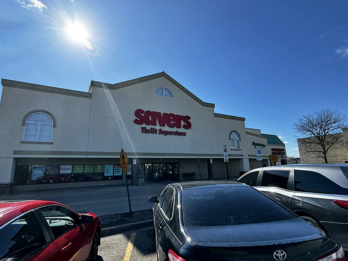 The iconic red Savers sign beckons like a lighthouse for bargain hunters. This unassuming exterior houses a universe of possibilities.