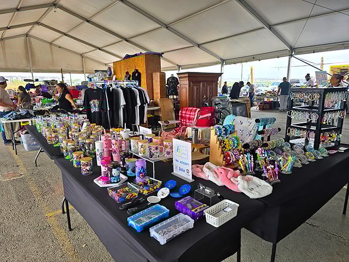 Under the big white tent, treasures await! Colorful tumblers, plush toys, and everyday gadgets transform ordinary tables into extraordinary retail adventures.