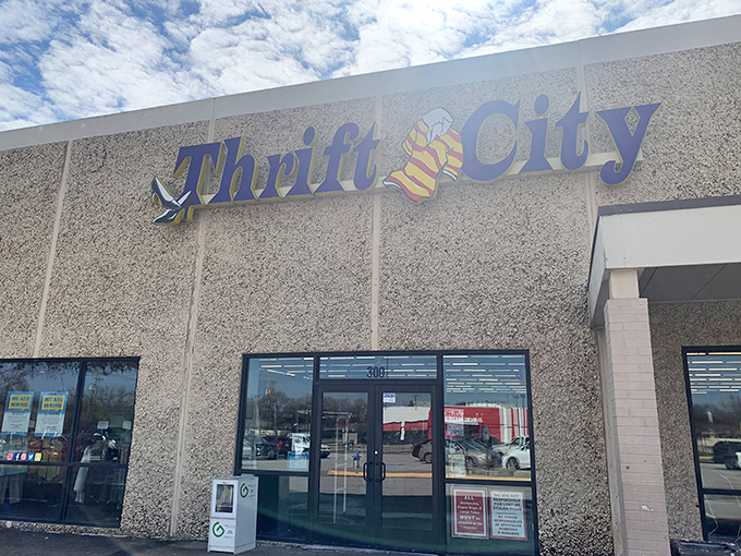 The iconic blue Thrift City sign beckons bargain hunters like a lighthouse for the frugally fashionable. Treasure awaits inside! 