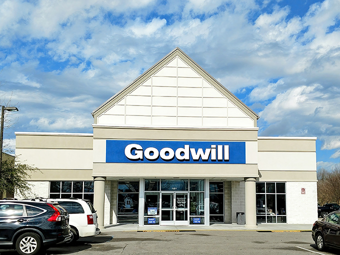 The unassuming exterior of Goodwill in Chesapeake hides a treasure trove within. Like finding a five-star restaurant in a strip mall, appearances can be delightfully deceiving.
