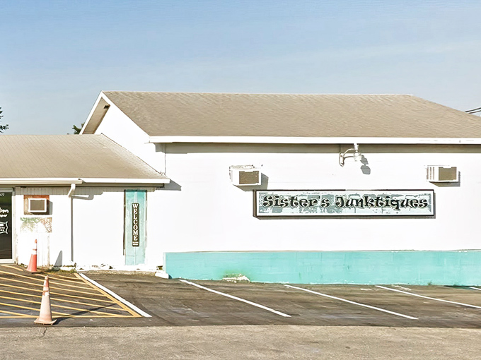 The unassuming exterior of Sisters Junktiques belies the wonderland within&mdash;like finding a portal to vintage paradise behind a modest storefront.