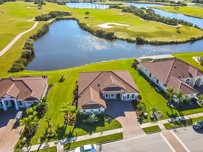 Pastel-colored buildings line the waterfront promenade, creating a scene that would make any Italian coastal town blush with envy.
