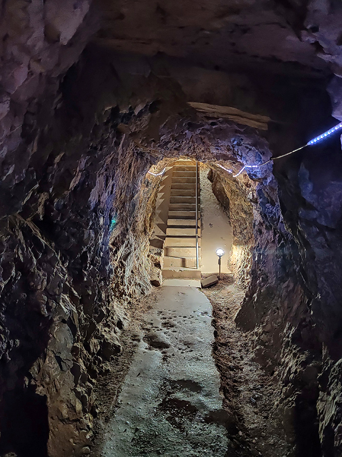 The stairway to subterranean heaven beckons with mysterious lighting and ancient stone walls. Indiana Jones would approve of this adventure's dramatic entrance.