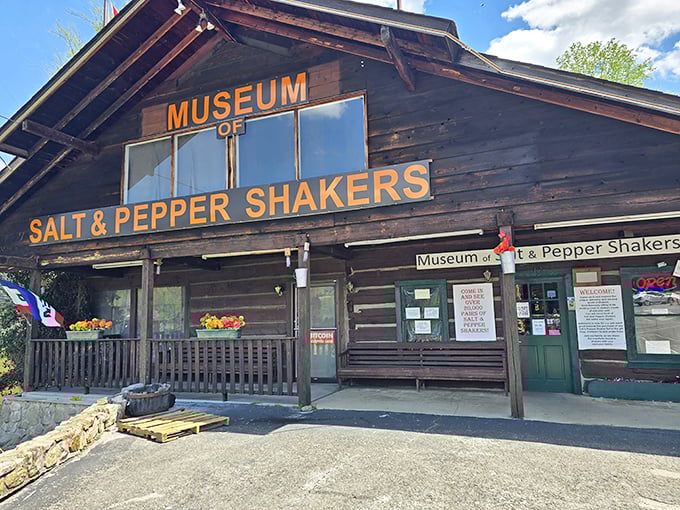 The rustic log cabin exterior of Gatlinburg's Salt & Pepper Shaker Museum promises a seasoned adventure inside. Who knew condiment containers could be so captivating?