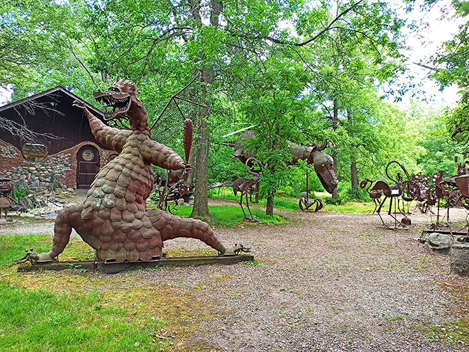The fearsome marsh dragon stands guard at Jurustic Park, its metallic scales gleaming in the sunlight as fellow prehistoric creatures lurk nearby.