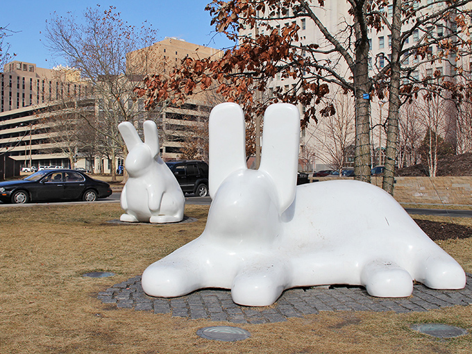 "Eros Bendato" lounges in his reflecting pool like someone who fell asleep during a spa day. Downtown St. Louis skyscrapers create the perfect backdrop for this iconic bronze head.