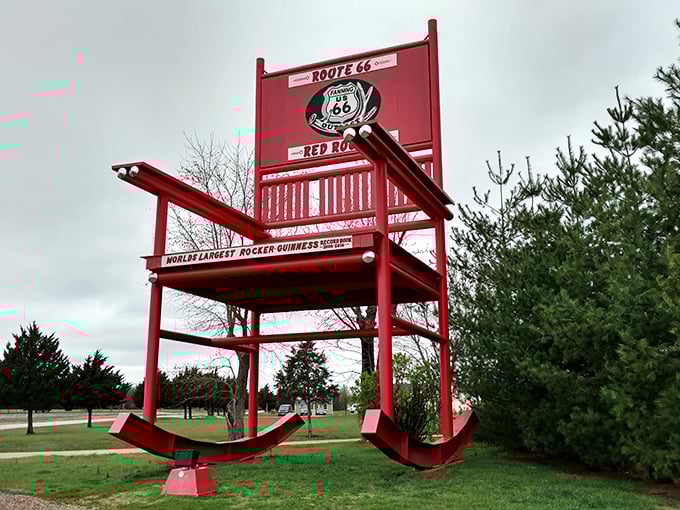 The crimson giant stands tall against the Missouri sky, a whimsical monument to America's love affair with making everyday objects ridiculously oversized.