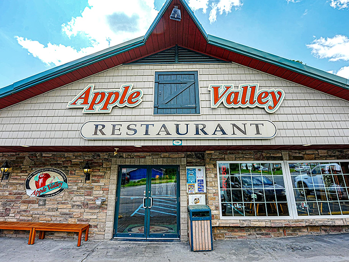 The iconic peaked roof of Apple Valley Restaurant stands like a culinary lighthouse, beckoning hungry travelers with promises of comfort food paradise in Milford.