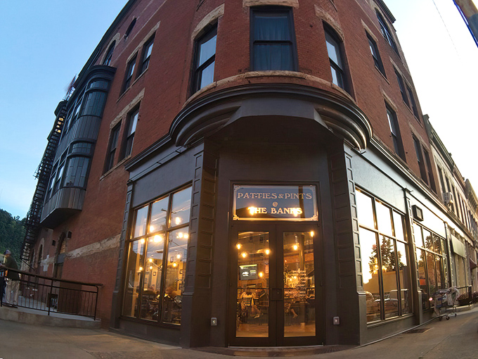 The corner entrance to culinary happiness. Patties & Pints' historic brick building stands like a sentinel guarding Portsmouth's best-kept secret.