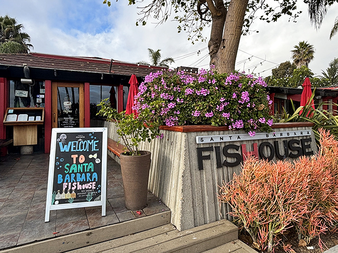 The vibrant bougainvillea framing Santa Barbara FisHouse's entrance isn't just pretty&mdash;it's nature's way of saying "seafood paradise ahead!"