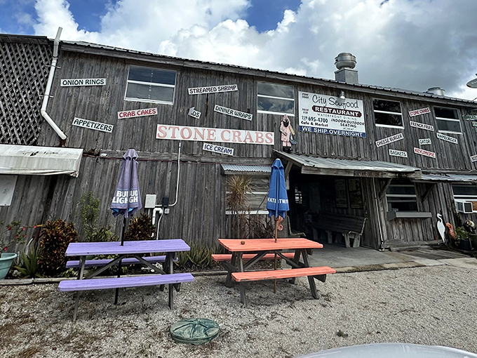 The weathered wooden exterior of City Seafood tells you everything you need to know&mdash;this place is about substance over style, and those colorful picnic tables promise a good time.