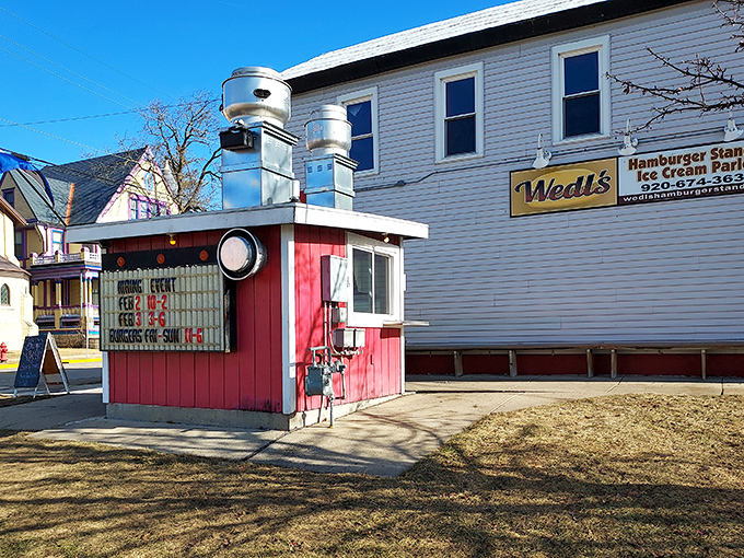The little red burger stand that could! Wedl's iconic exterior might be small, but those twin ventilation stacks announce serious burger business.