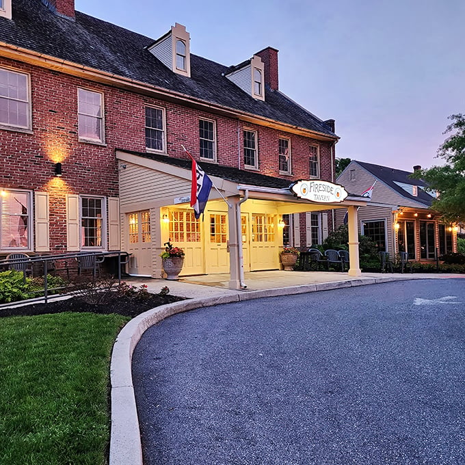 The historic brick fa&ccedil;ade of Fireside Tavern stands proudly in Strasburg, welcoming hungry travelers with its colonial charm and promise of culinary delights within.