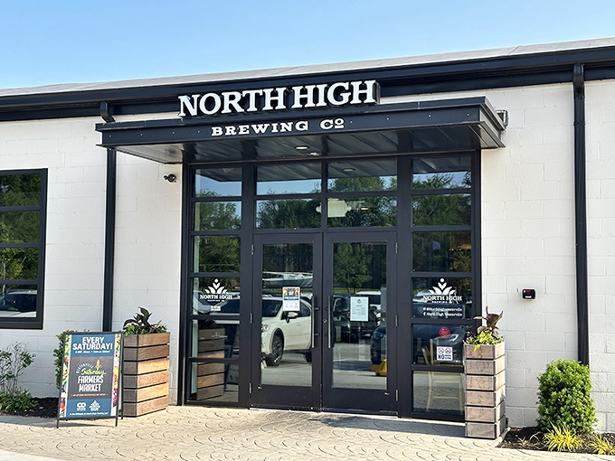 The sleek exterior of North High Brewing beckons like a modern-day oasis for the thirsty traveler. Clean lines and wooden planters promise good things inside.